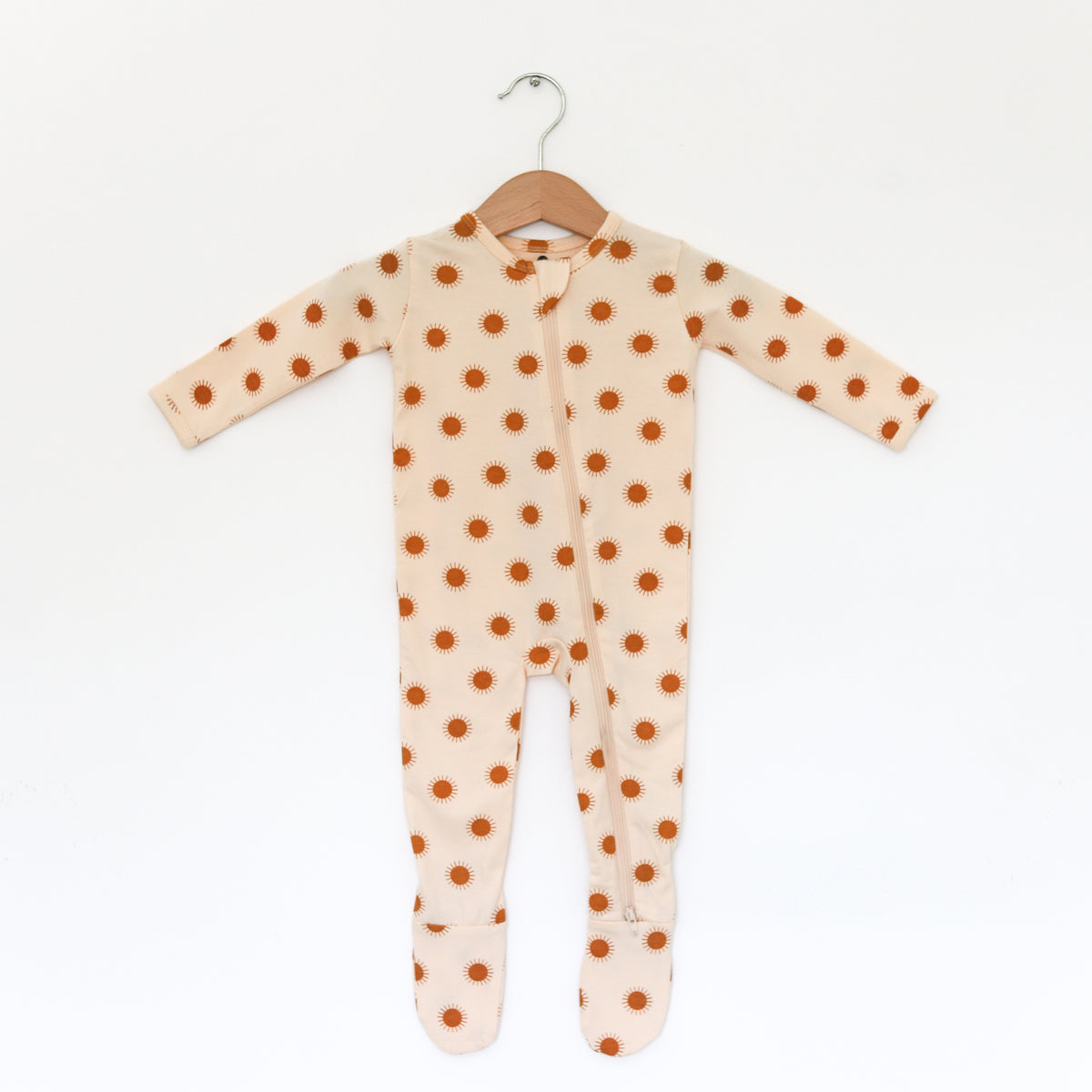 SUN PATTERNED FOOTED SLEEPER – Wildwood Landing LLC